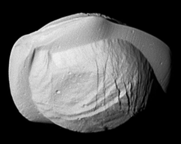 Cassini Returns Stunning New Close-Up Images of Saturn’s ‘Ravioli’ Moon ...