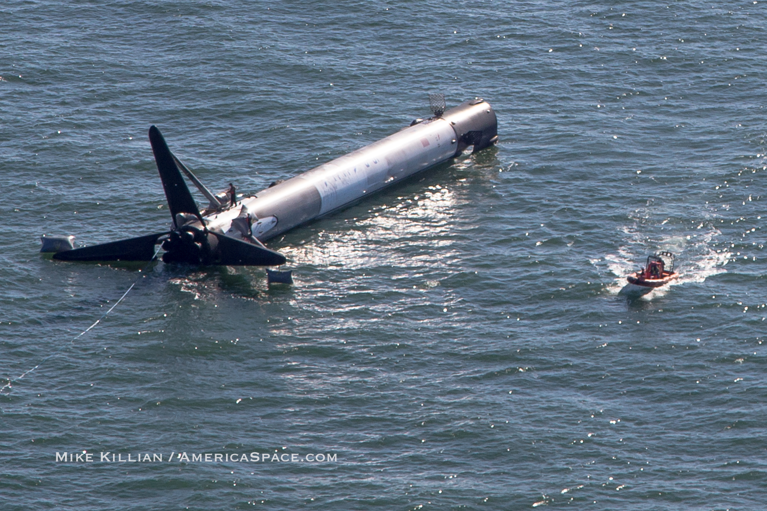 Teams Recover, Tow Floating Falcon 9 Rocket into Port Canaveral ...