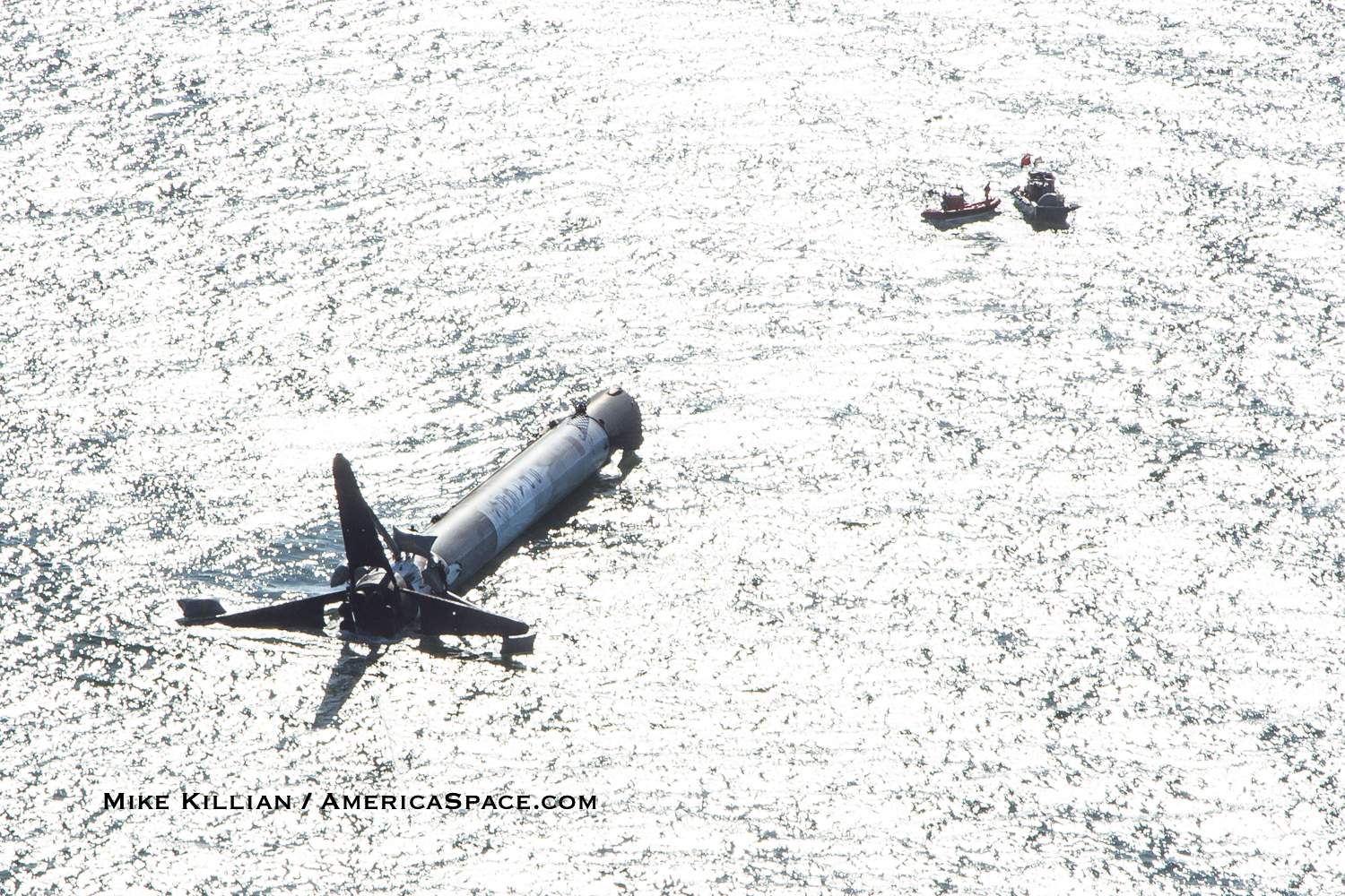 Teams Recover, Tow Floating Falcon 9 Rocket into Port Canaveral ...